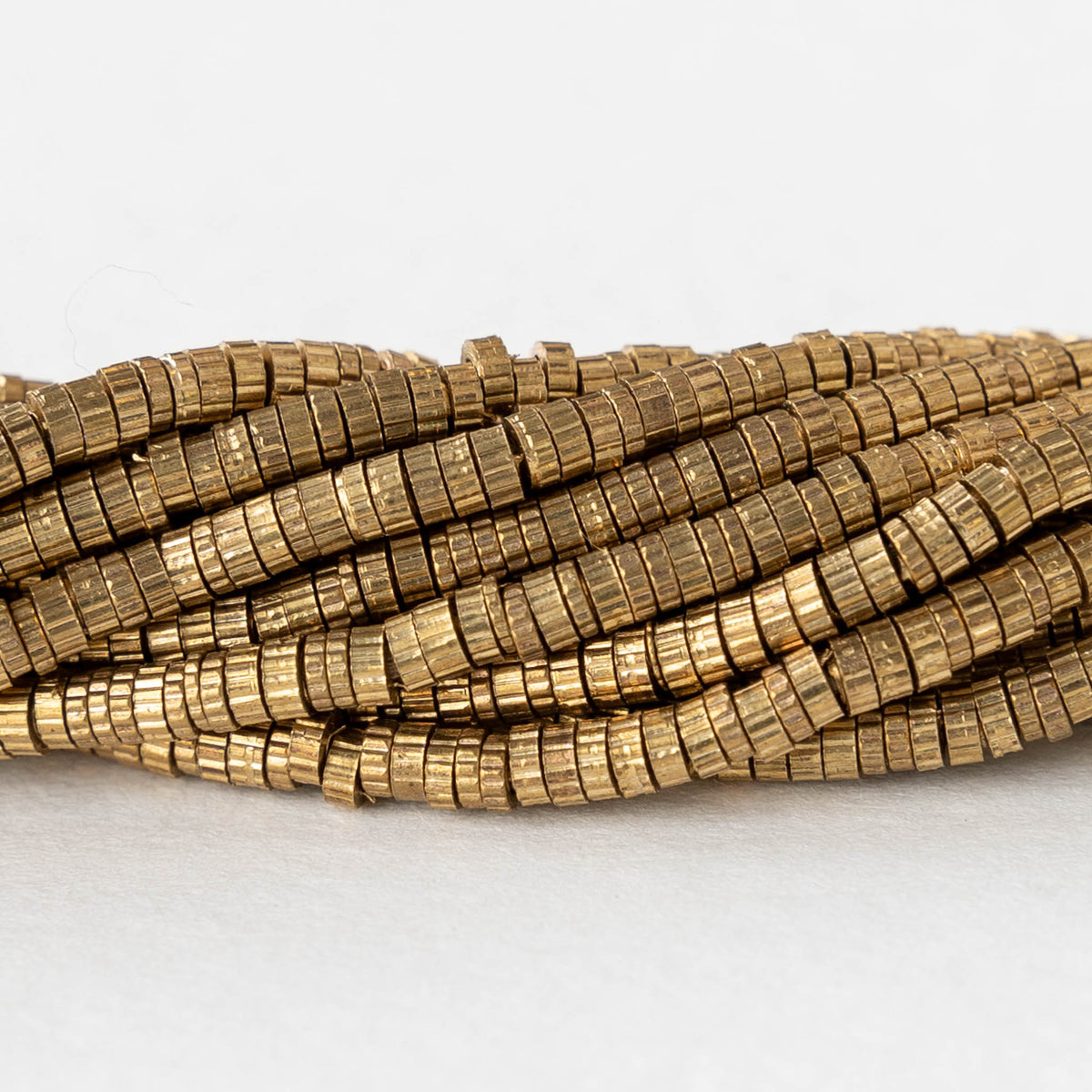 2.5mm Cog Spacer Beads - Antique Brass - 50 Beads – funkyprettybeads