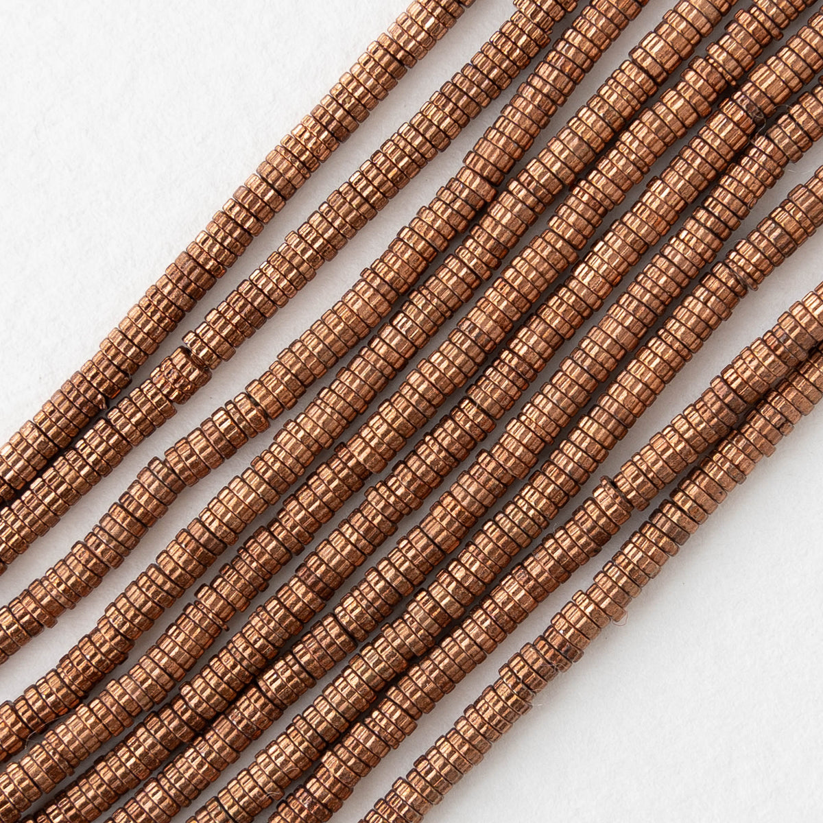 2.5mm Cog Spacer Beads - Antique Copper - 100 Beads – funkyprettybeads
