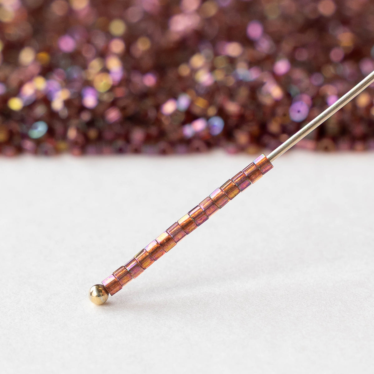 1mm Delica Hex Cut Seed Beads - Red Gold Iris - 5 grams – funkyprettybeads